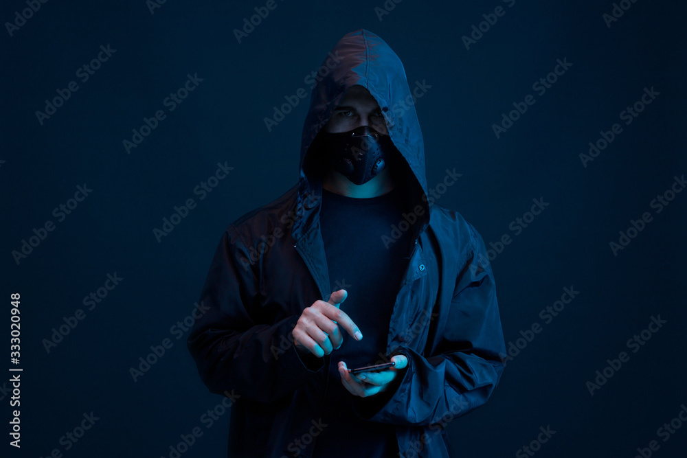Dangerous Hooded Hacker With Smartphone In His Hand Internet Cyber