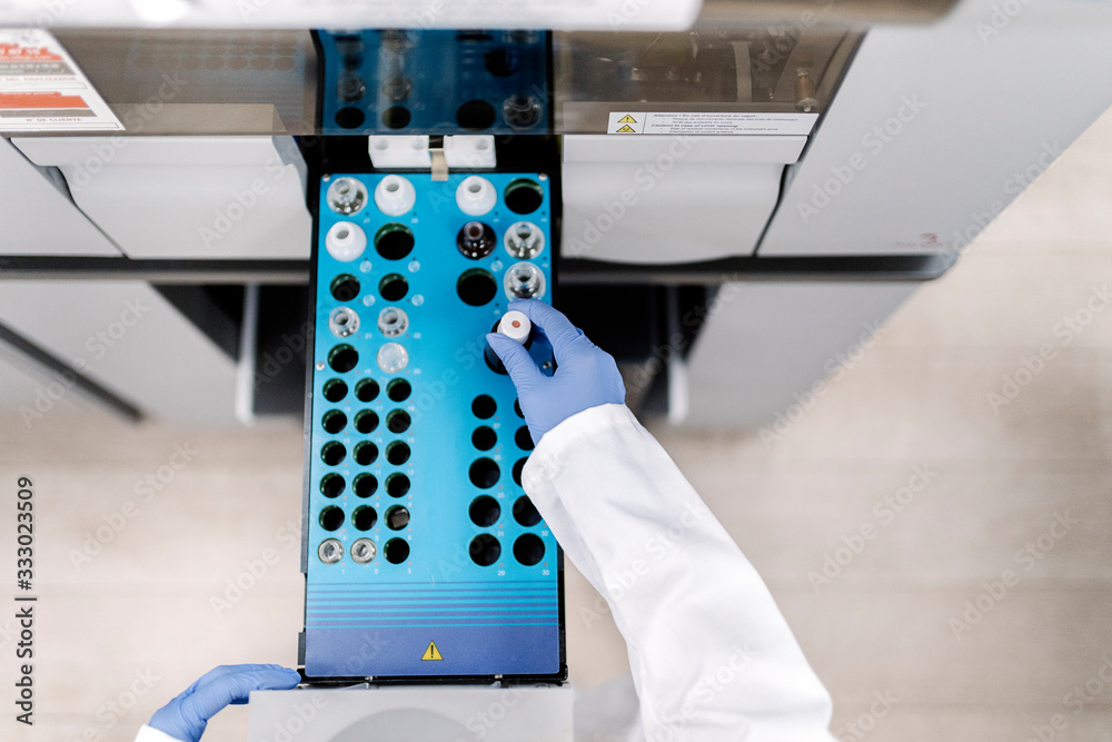 Biologist working with blood samples in the lab Stock Photo | Adobe Stock