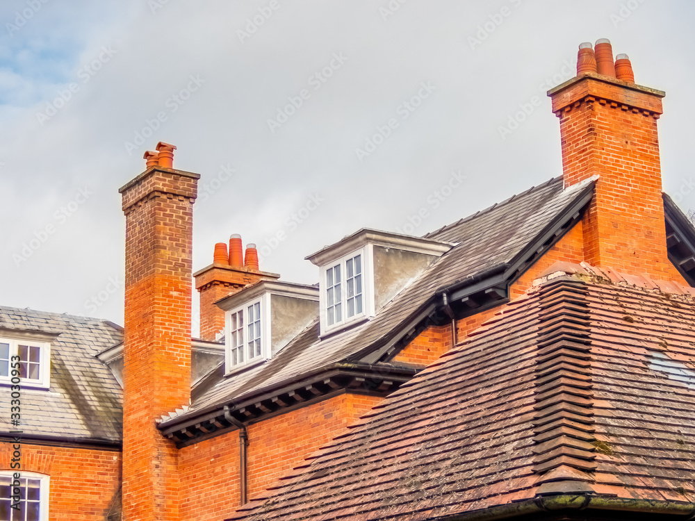 Red roof and chimneys with attic windows. Woodhall Spa. England Stock ...