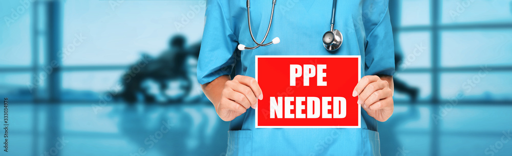 PPE Coronavirus masks shortage. Doctor holding message sign for lack of ...