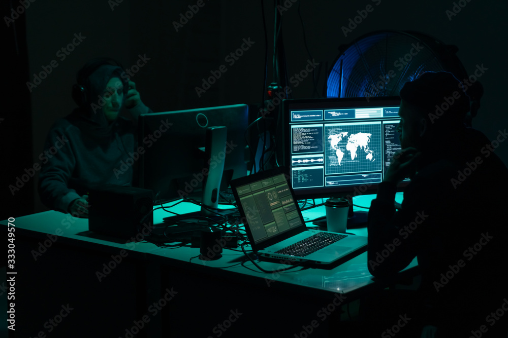 Hackers making cryptocurrency fraud using virus software and computer interface. Blockchain ...