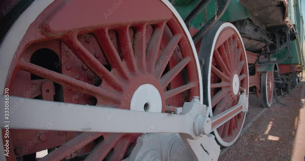 Wheels of an old steam train. Soviet steam locomotive with red star ...