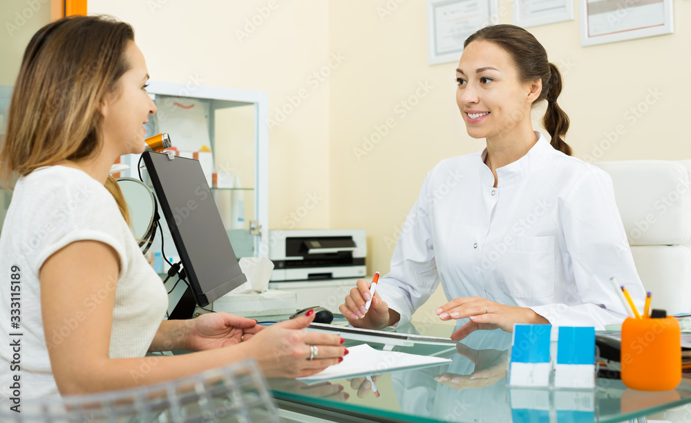Female client visiting in aesthetic medicine center Stock Photo | Adobe ...