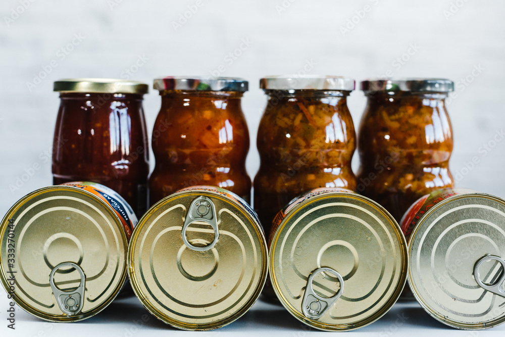cans of canned food, long-stored foods, food supplies for a difficult ...