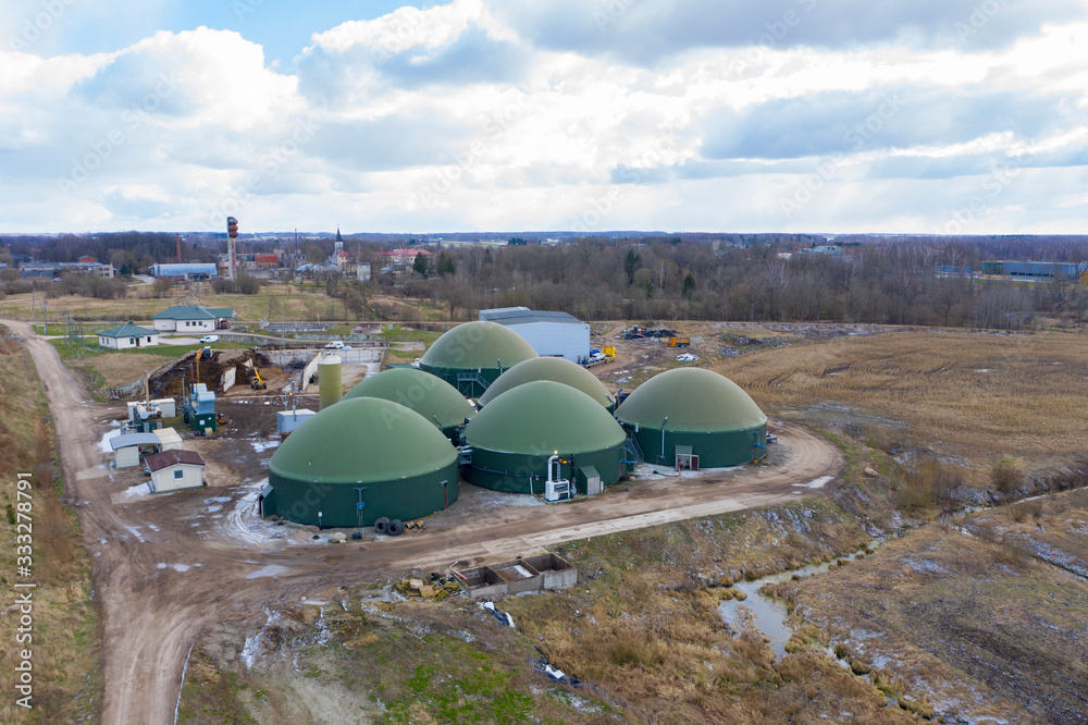 Aerial view of green biogas plant storage tanks Stock Photo | Adobe Stock