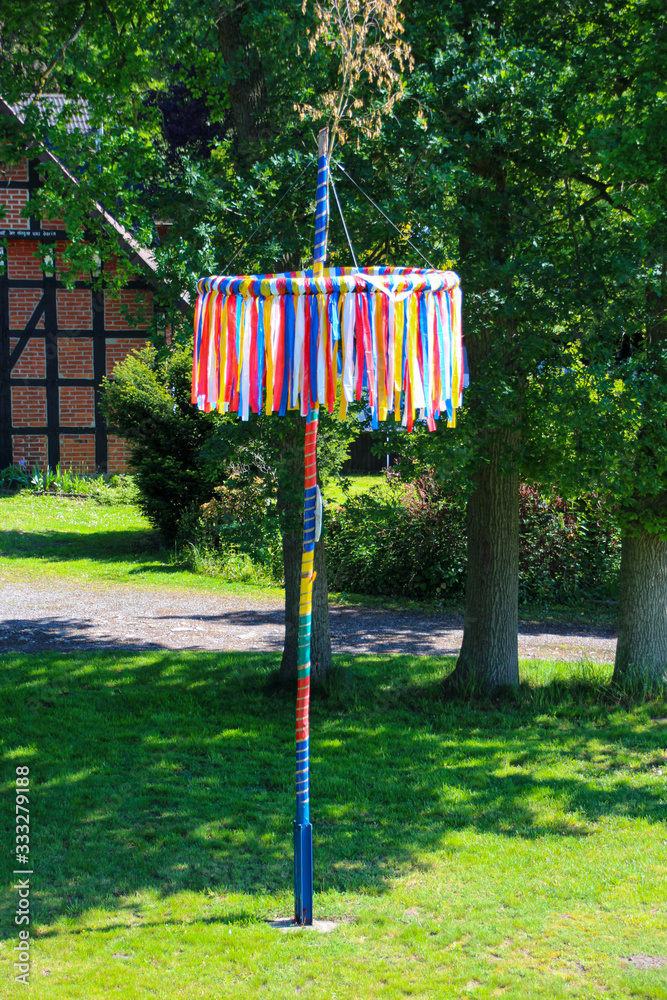 traditional maypole with half-timbered house in may Stock Photo | Adobe ...