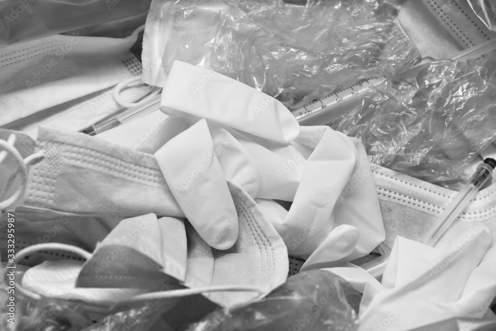 Medical trash. Coronavirus protection equipment in medical waste bin ...