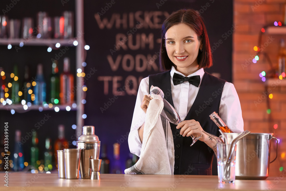 Beautiful female bartender in pub Stock Photo | Adobe Stock