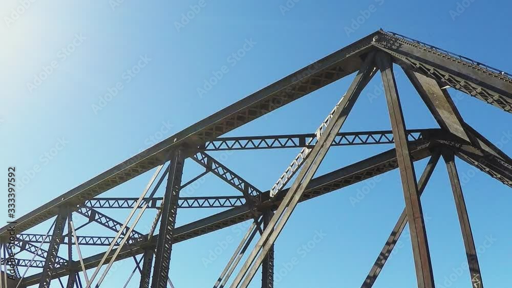 Pan From Old Style Railroad Truss Bridge To Modern Commuter Railway ...