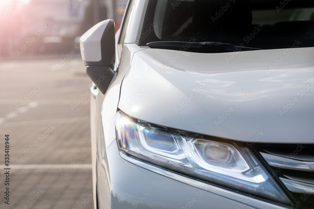 Led headlight of a white modern car. Modern trends in the automotive ...
