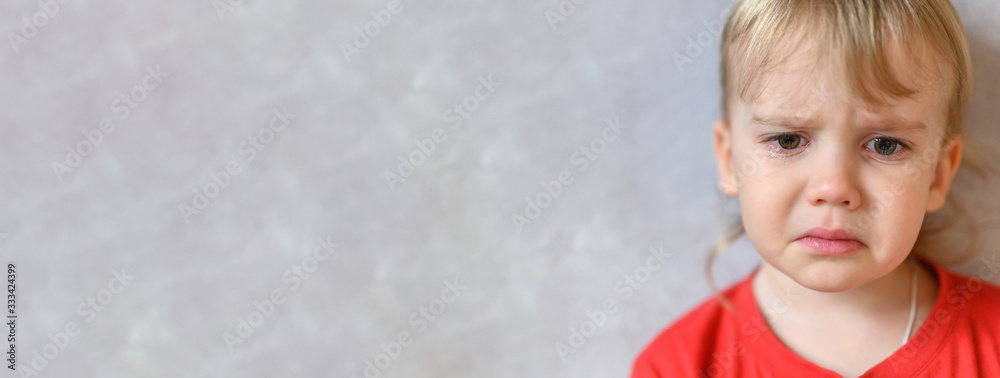 kid crying. the face of a cute little upset four year old baby boy in ...