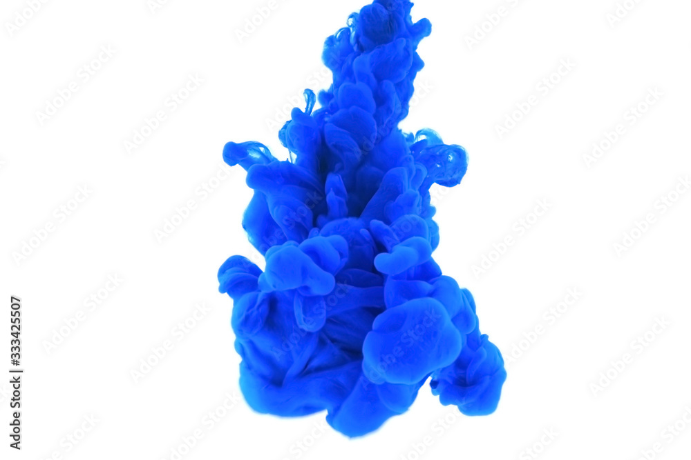 Color paint drops in water. Blue watercolor ink in water on a white ...