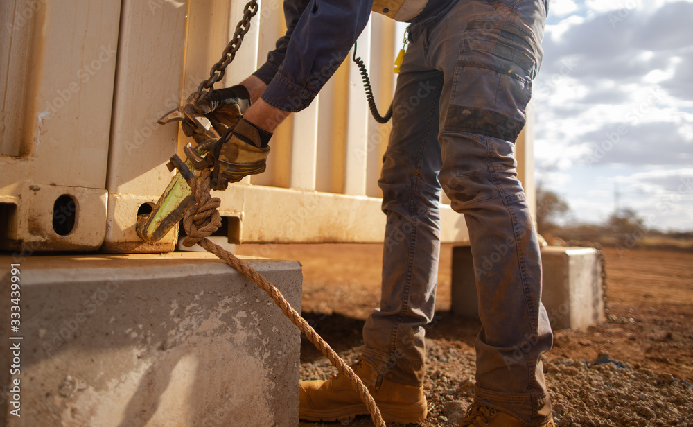 Safe workplace trained competent rigger wearing a safety hand ...