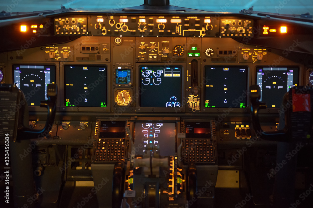 Cockpit (flight deck) of a modern commercial passenger jet aircraft ...