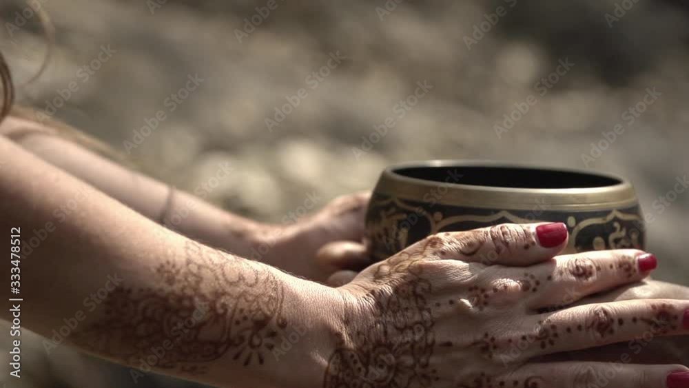 The old monk passes the holy grail, the monk gives the girl a cup of ...