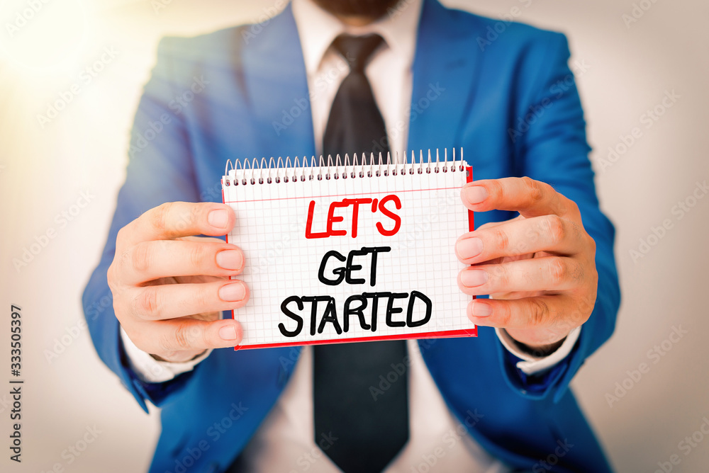 Writing note showing Lets Is Get Started. Business concept for to begin ...