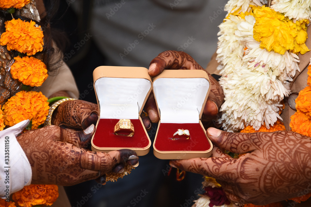 Indian couple on their ring ceremony function Stock Photo | Adobe Stock