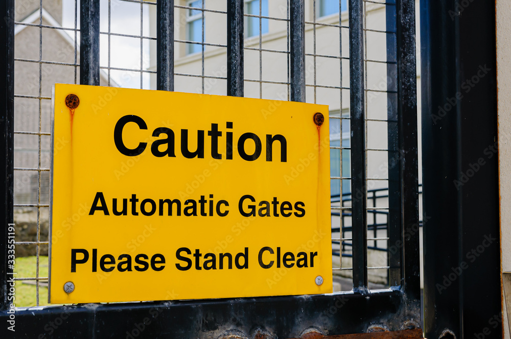 Sign at a heavily fortified PSNI police station "Caution: automatic ...