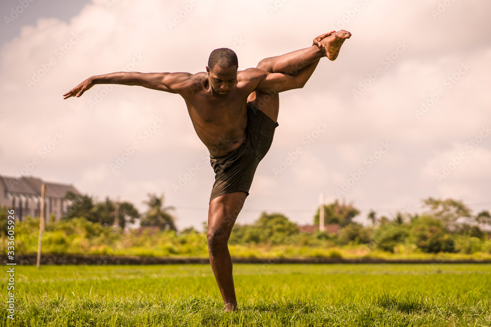 ballet dancer and choreographer workout - young athletic and fit black ...