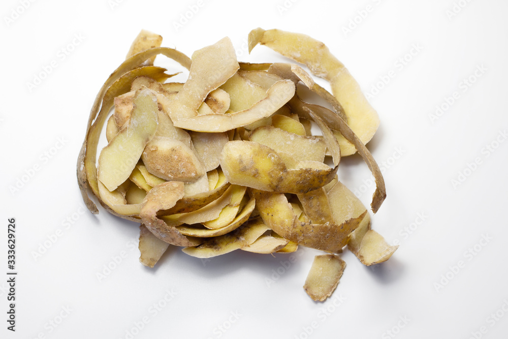 Food waste potato on a white background. Isolate. Top view. Flat lay ...