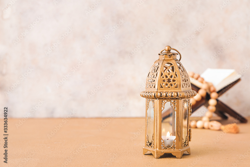 Muslim lamp on color table Stock Photo | Adobe Stock