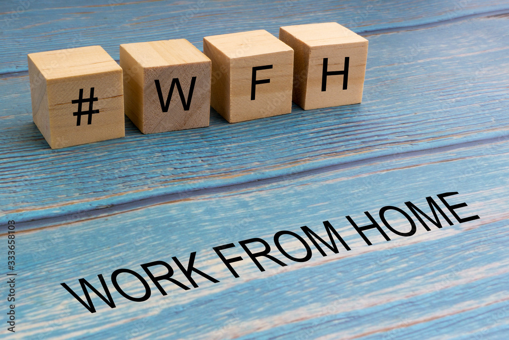 Concept image a wooden block and word - #WFH ( WORK FROM HOME ) on ...