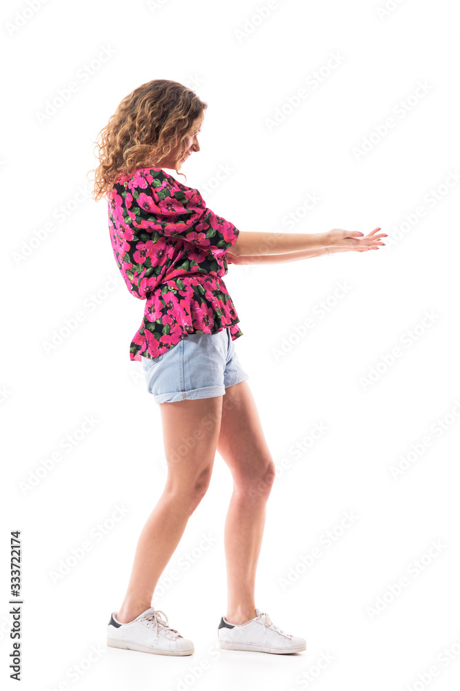 Side View Of Happy Young Woman With Outstretched Arms For Hug Inviting side-view-of-happy-young-woman-with-outstretched-arms-for-hug-inviting
