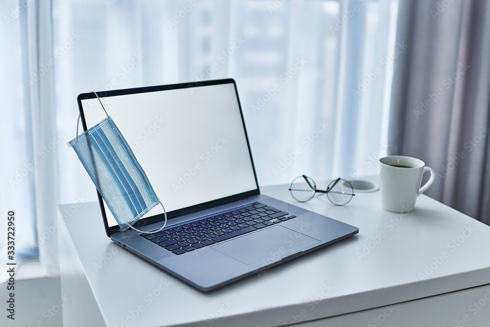 Using a medical protective mask in the workplace while online working ...