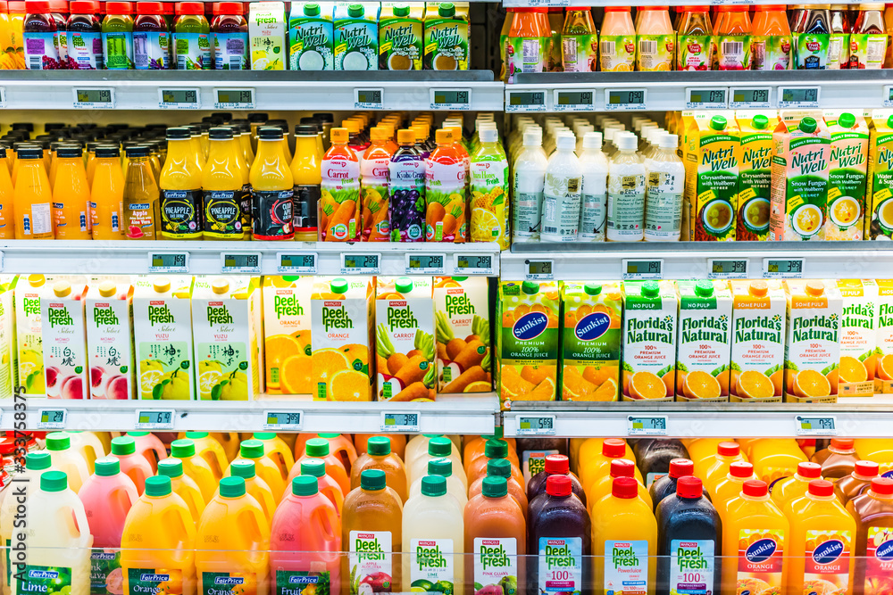 Juice boxes and cold drinks in a commercial refrigerator Stock Photo ...