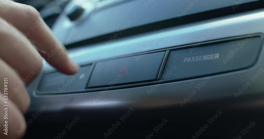 Close view of pressing the emergency button in the car Stock Video ...