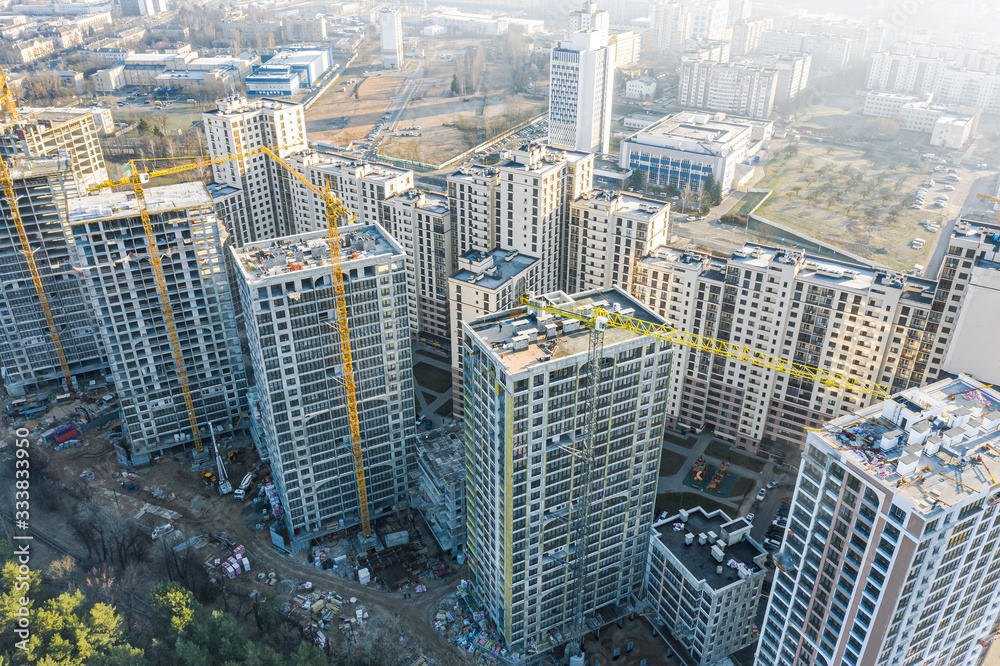 aerial topdown view of large construction site in city. new high-rise ...