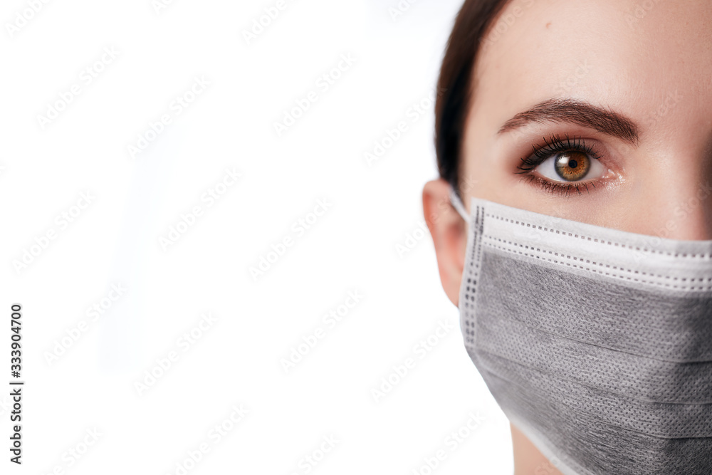 Young medic nurse wearing medical mask on face, coronavirus covid 19 ...