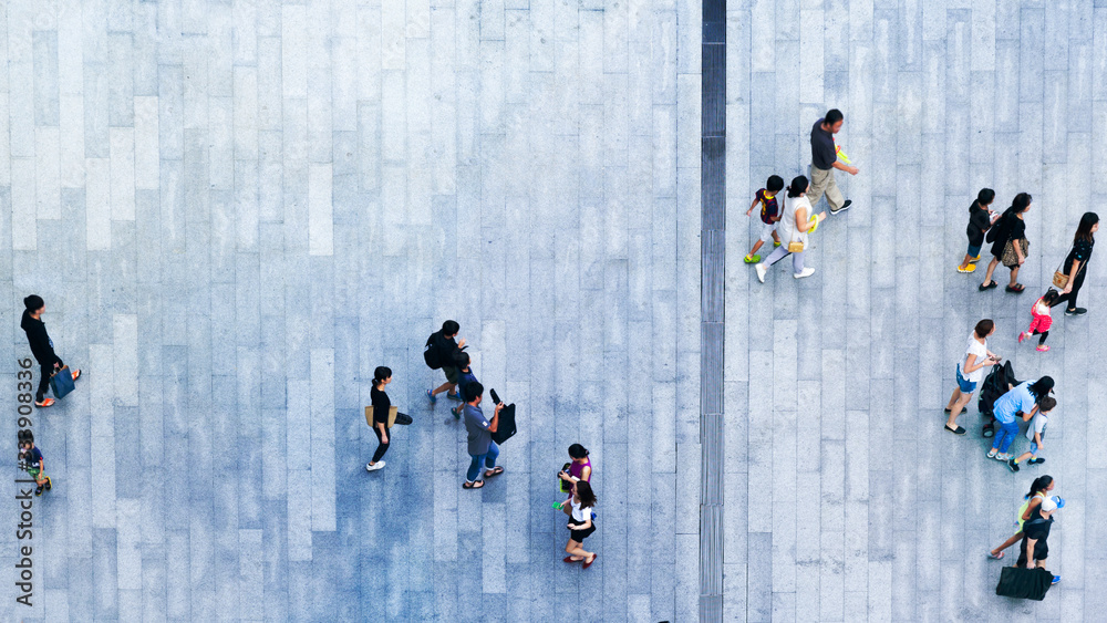 op view of social distance people are walking in public space on ...