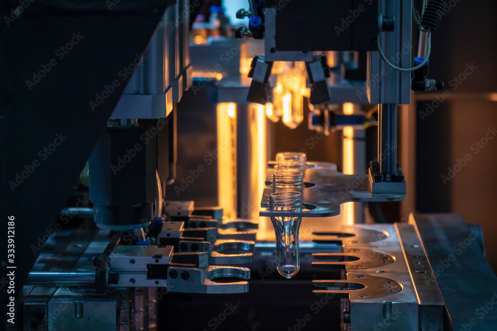 The tube preform shape of bottles preheat process on the production ...