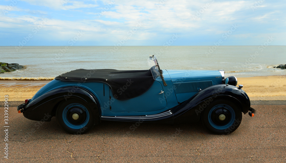 Classic Blue Sunbeam Talbot Motor Car parked on seafront promenade with ...
