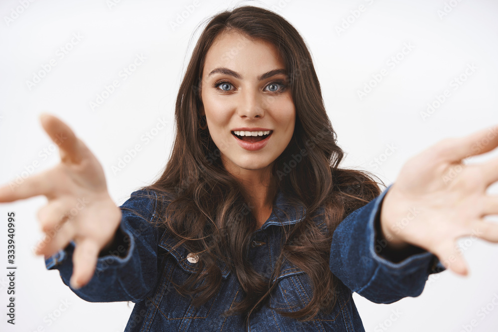 Girl reaching to you. Attractive feminine young woman stretching hands ...