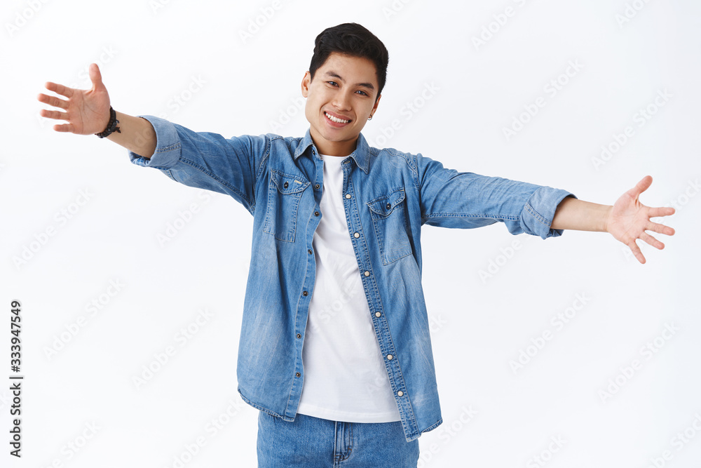 Portrait of friendly charismatic young handsome taiwanese man reaching ...