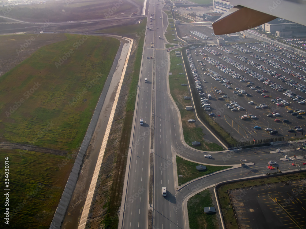From plane window road and auto park view Stock Photo | Adobe Stock