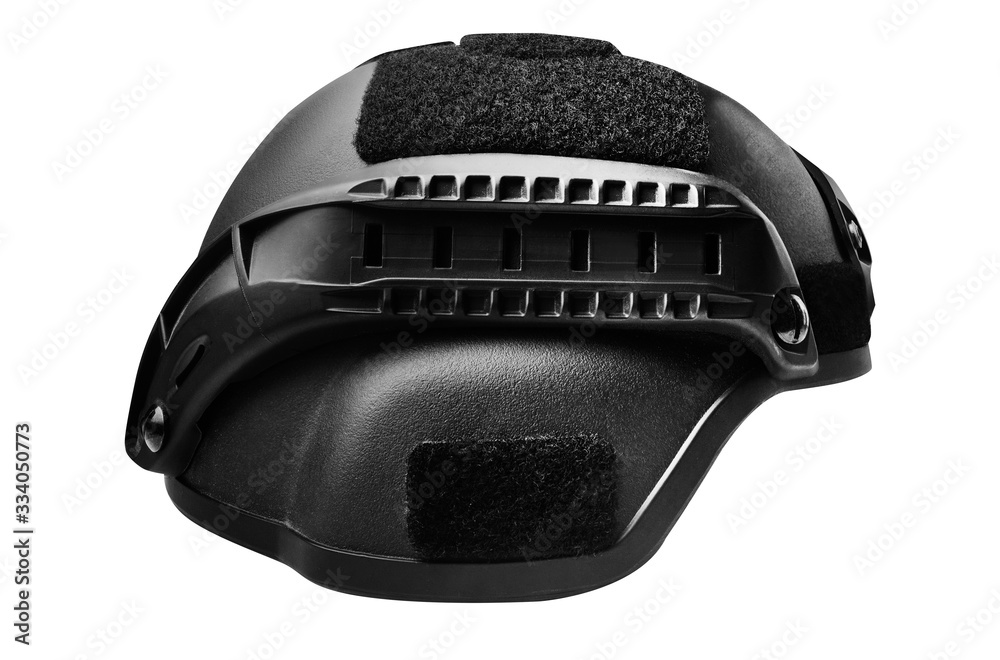 Isolated black military helmet side view. Stock Photo | Adobe Stock