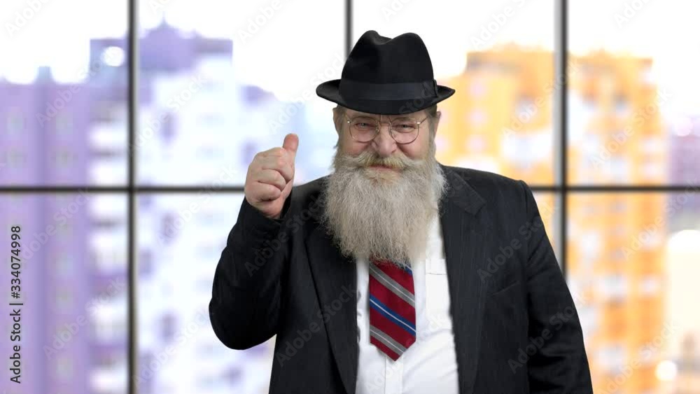 Rich old man in business suit showing thumb up. Long-bearded senior ...