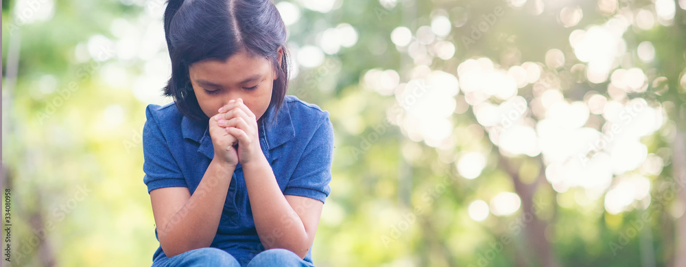 Pray concept.Asian child praying, hope for peace and free from disease ...