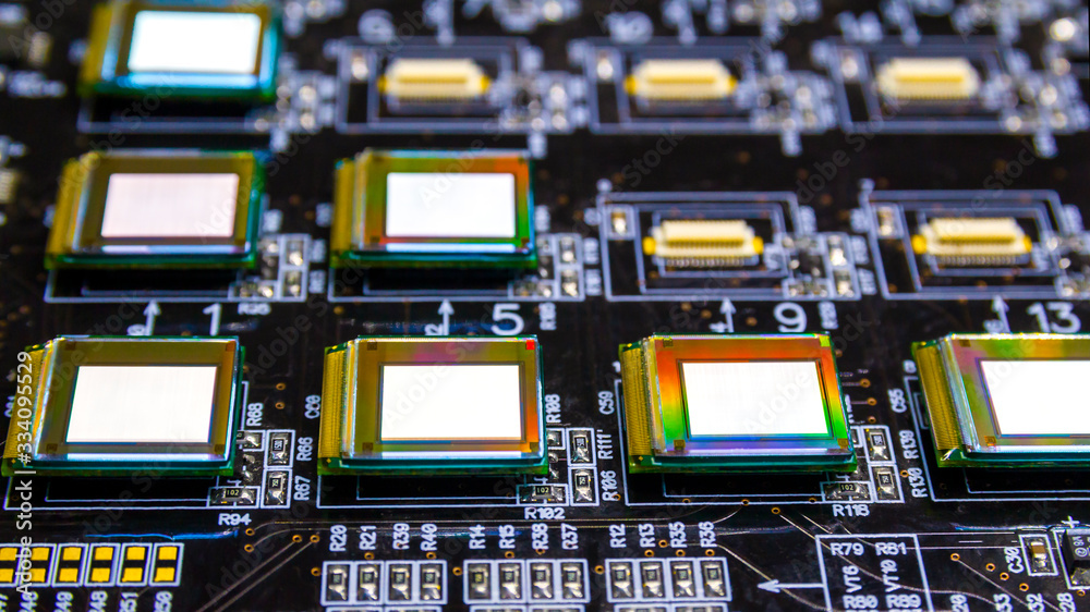 Several microdisplays bright of white color on the test station ...