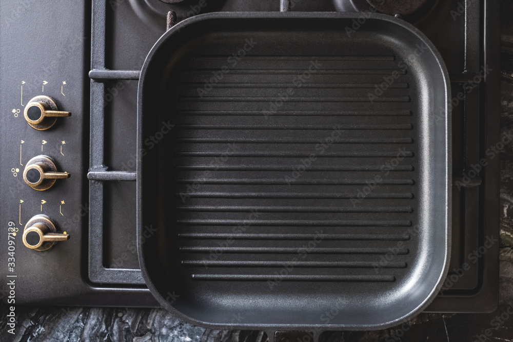 Grill pan rectangular shape, non-stick coating and several parallel ...