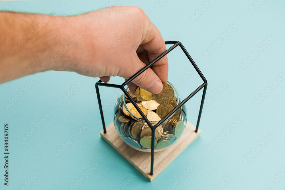 Cash coins in a bank house. The accumulation of money at home ...