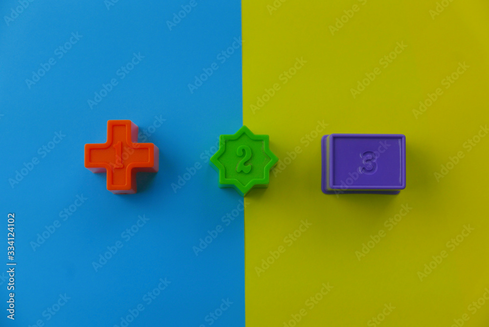 Top view of various shapes with numbers of 123 on two color background ...