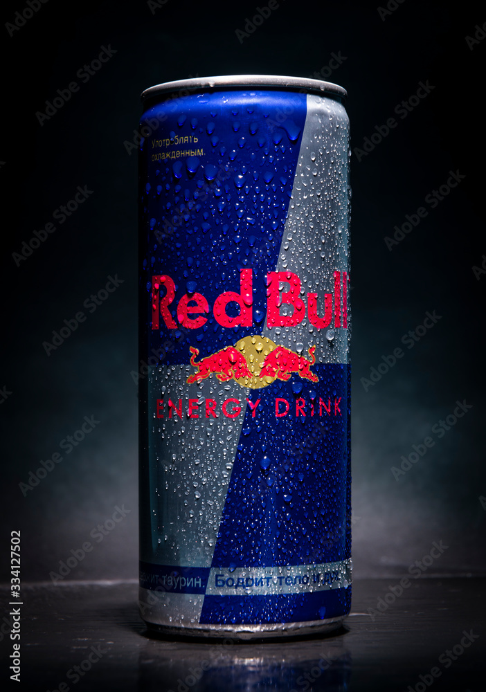 Sankt-Petersburg, Russia - December 25, 2018: Aluminum can of RedBull drink with water drops ...