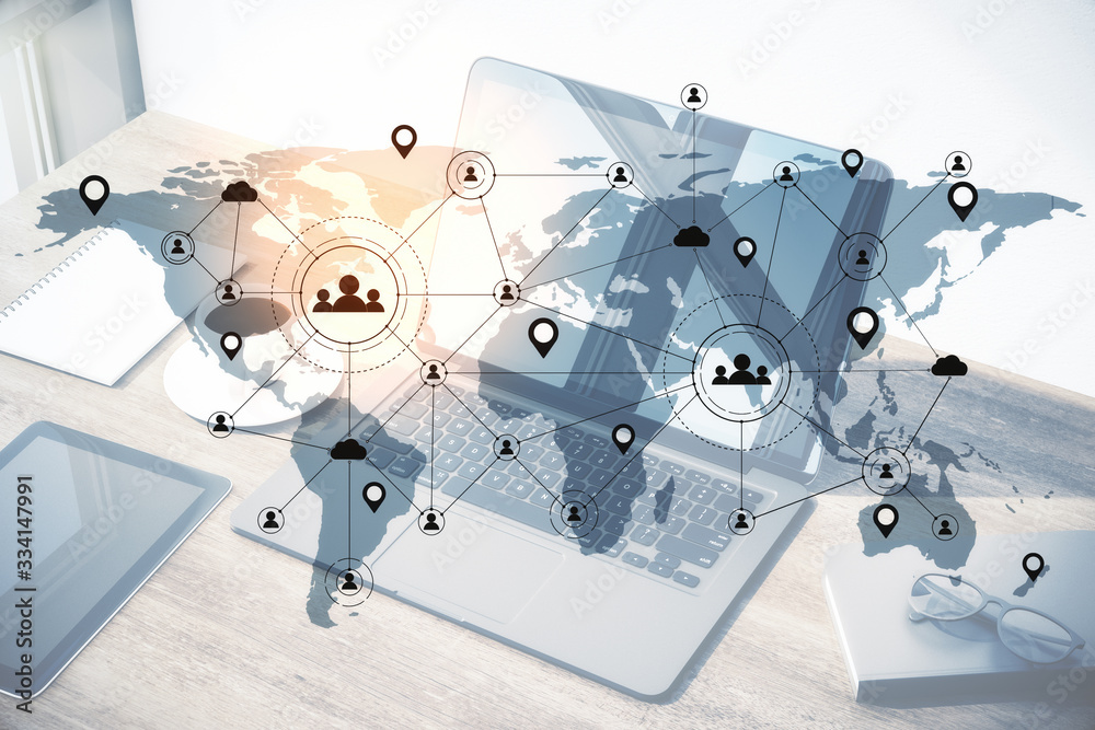 Laptop on desktop with remote work interface hologram Stock Photo ...