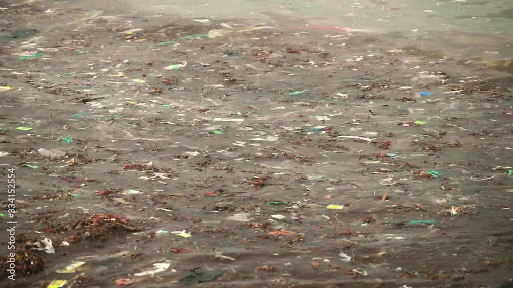 Slow motion. Waves of garbage on worlds most polluted beach in Bali ...