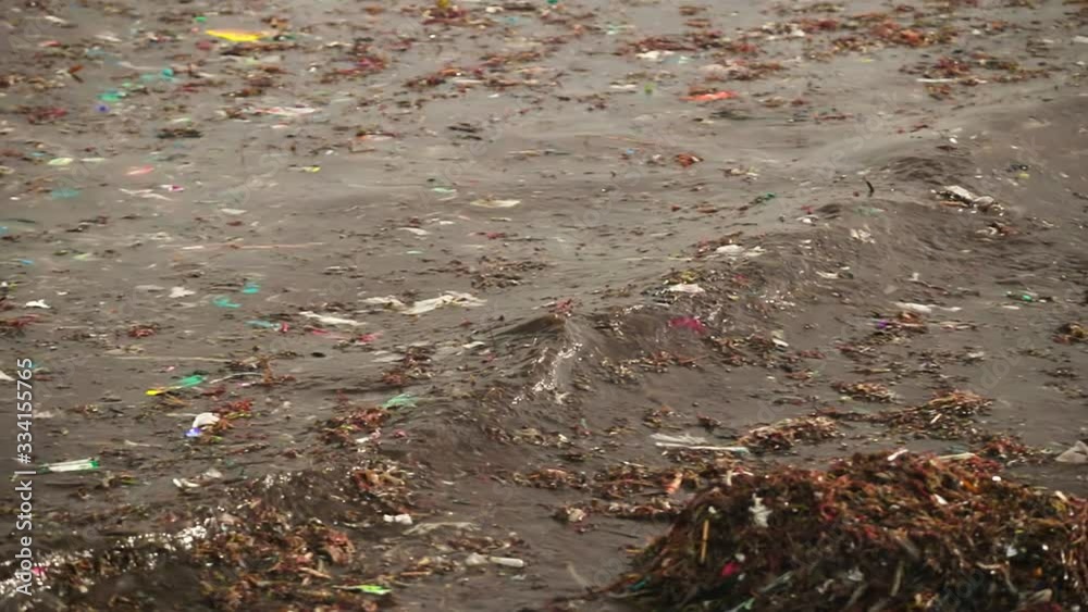 Slow motion. Waves of garbage on worlds most polluted beach in Bali ...