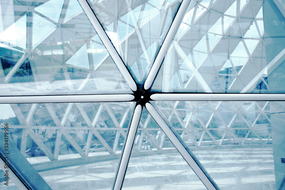 blur Building structures aluminum triangle geometry on facade of modern ...